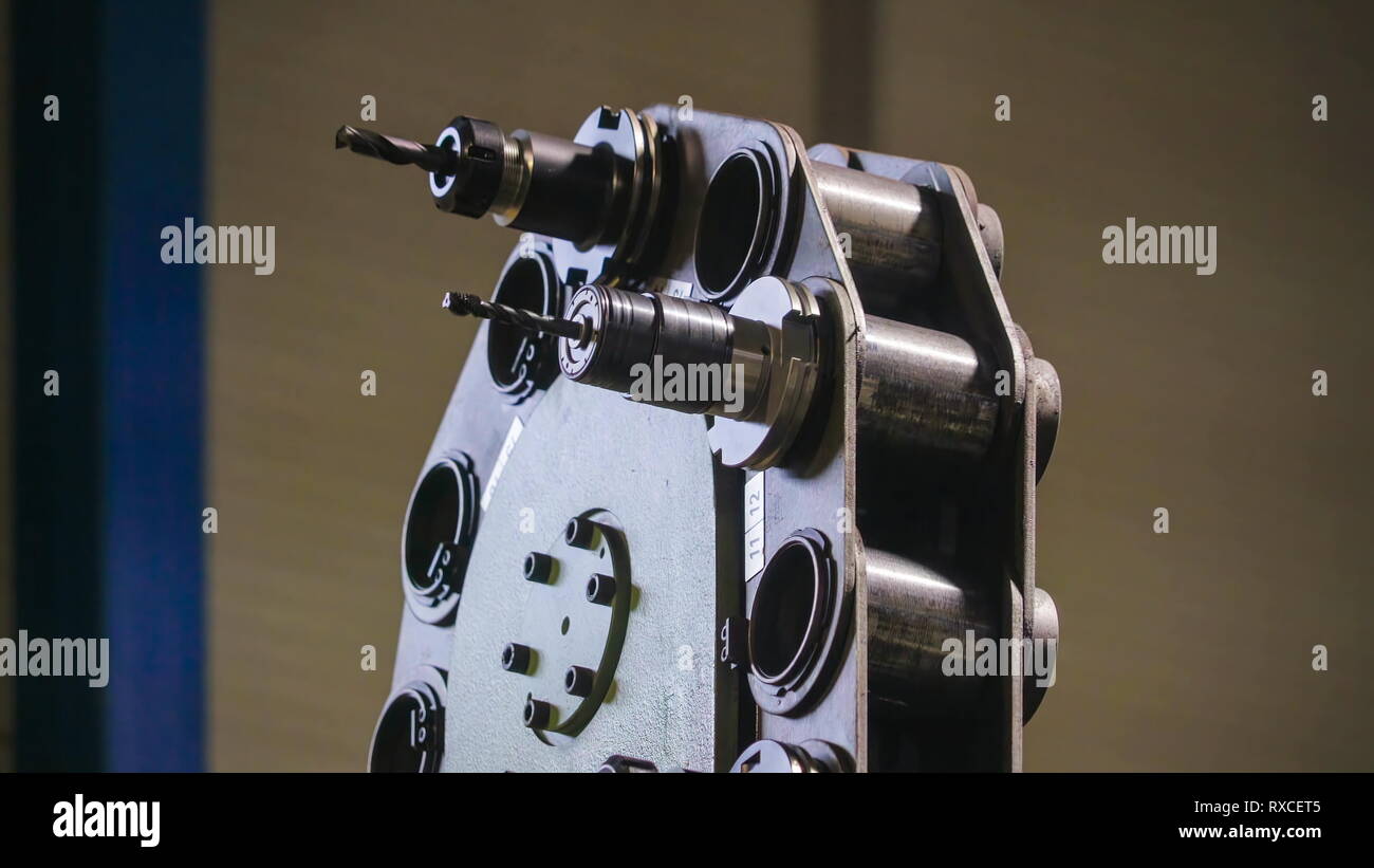 A big machine with lots of holes on the side. This is where small pipe ...