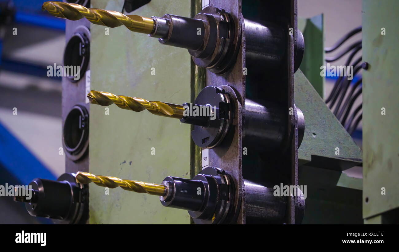 Three drilling guns ready to be used. The gold drill from the big ...