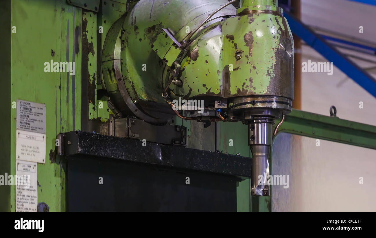 Processing of the metals using the machine. The green machine is at ...