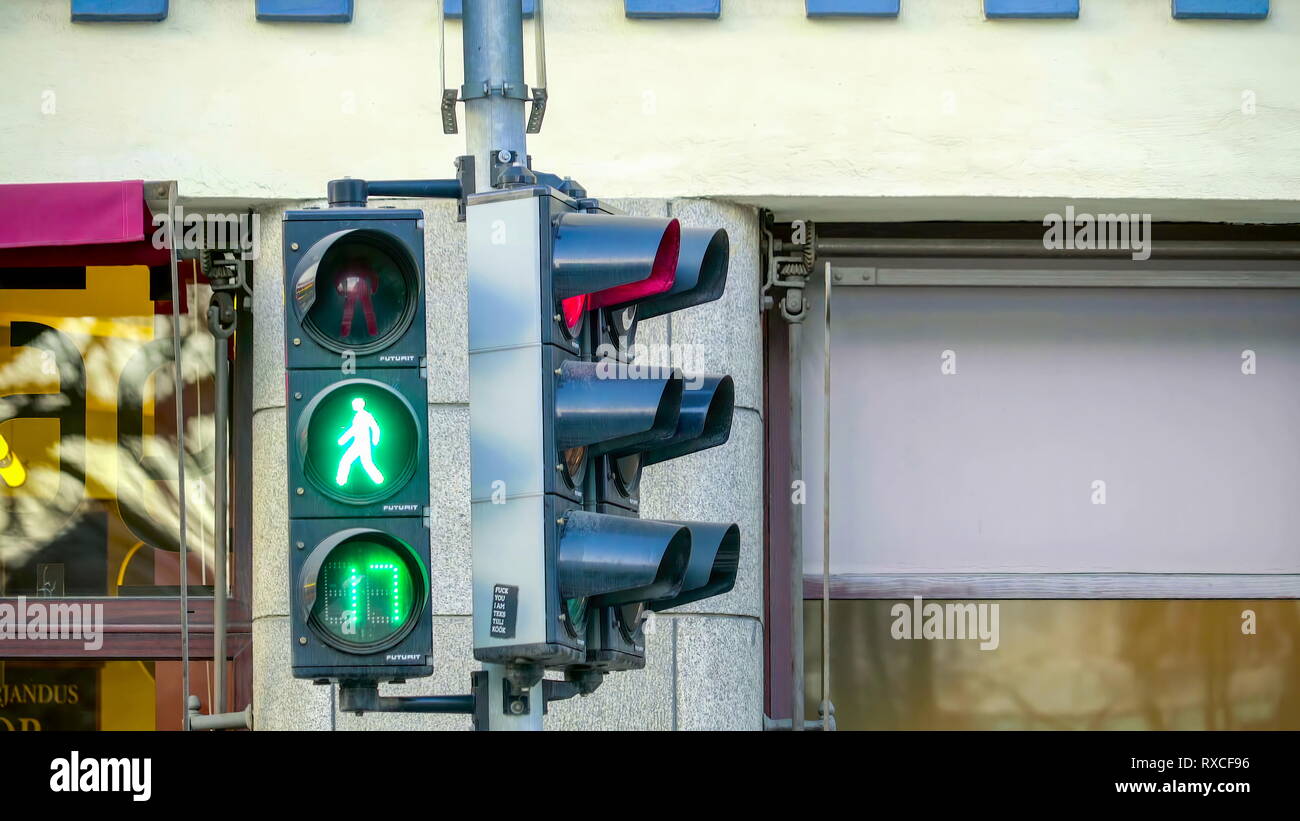 The pedestrian traffic light with the timer it says go and pedestrian ...