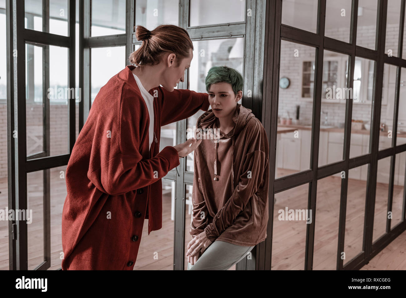 Green-haired girlfriend feeling scared of crazy angry boyfriend Stock ...