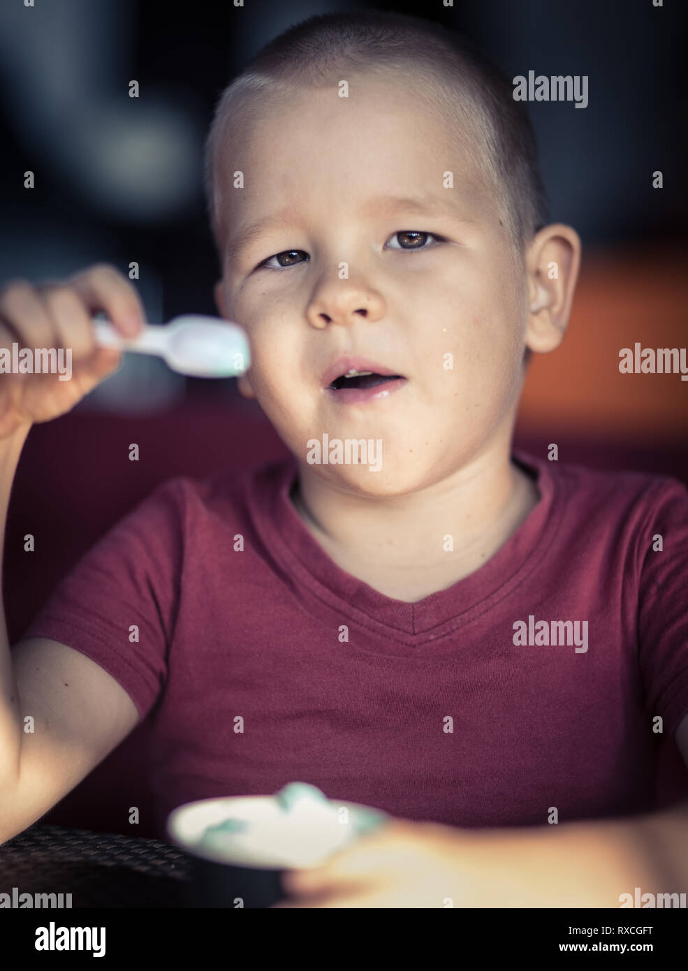 Cute boy eating hi-res stock photography and images - Alamy