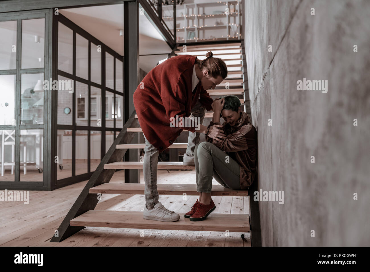 Girlfriend feeling afraid of her angry emotional boyfriend Stock Photo ...