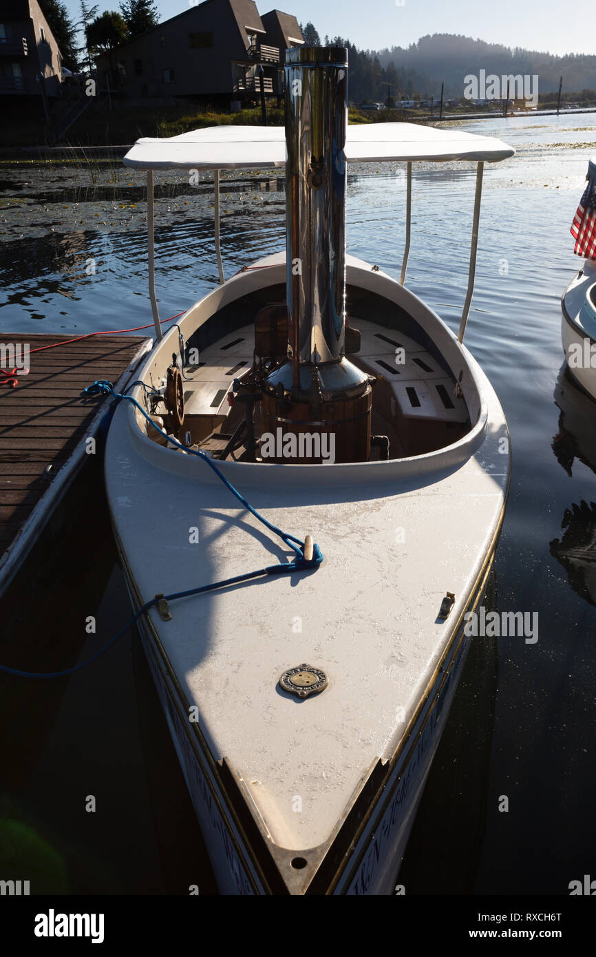 A frontal view of a white steam boat used for recreation and fishing at ...