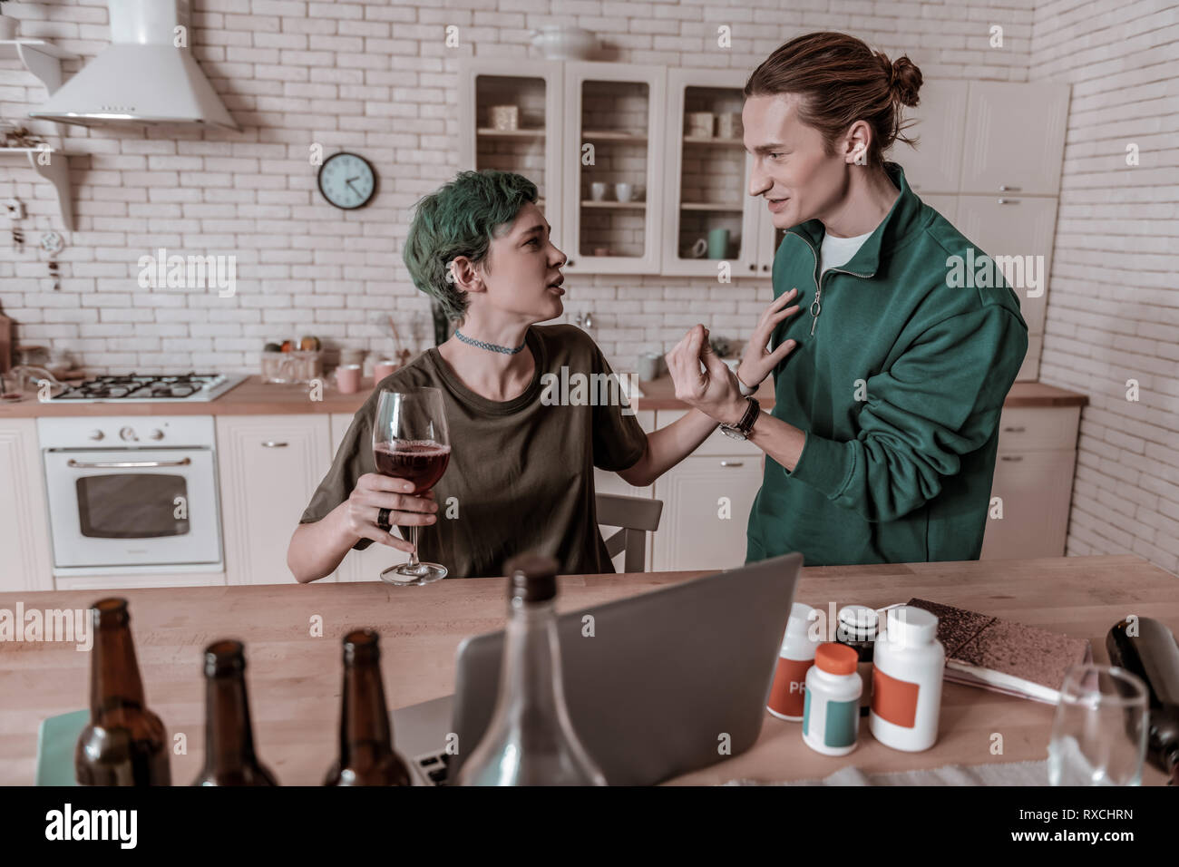 Boyfriend feeling angry at his girlfriend addicted to alcohol Stock ...