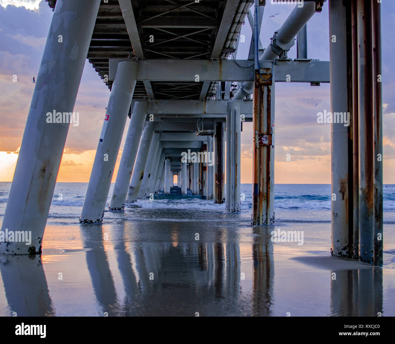Underneath oceanside pier hi-res stock photography and images - Alamy