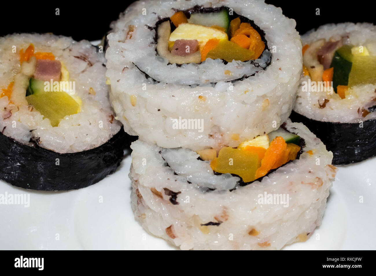 Stacked sushi roll placed on a white plate, Asian cuisine, Koren Dish ...