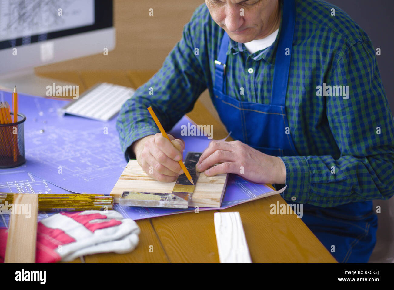 profession, carpentry, woodwork and people concept - carpenter testing ...