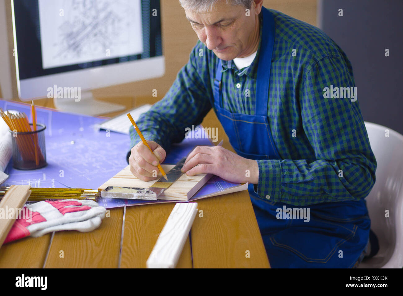 profession, carpentry, woodwork and people concept - carpenter testing ...