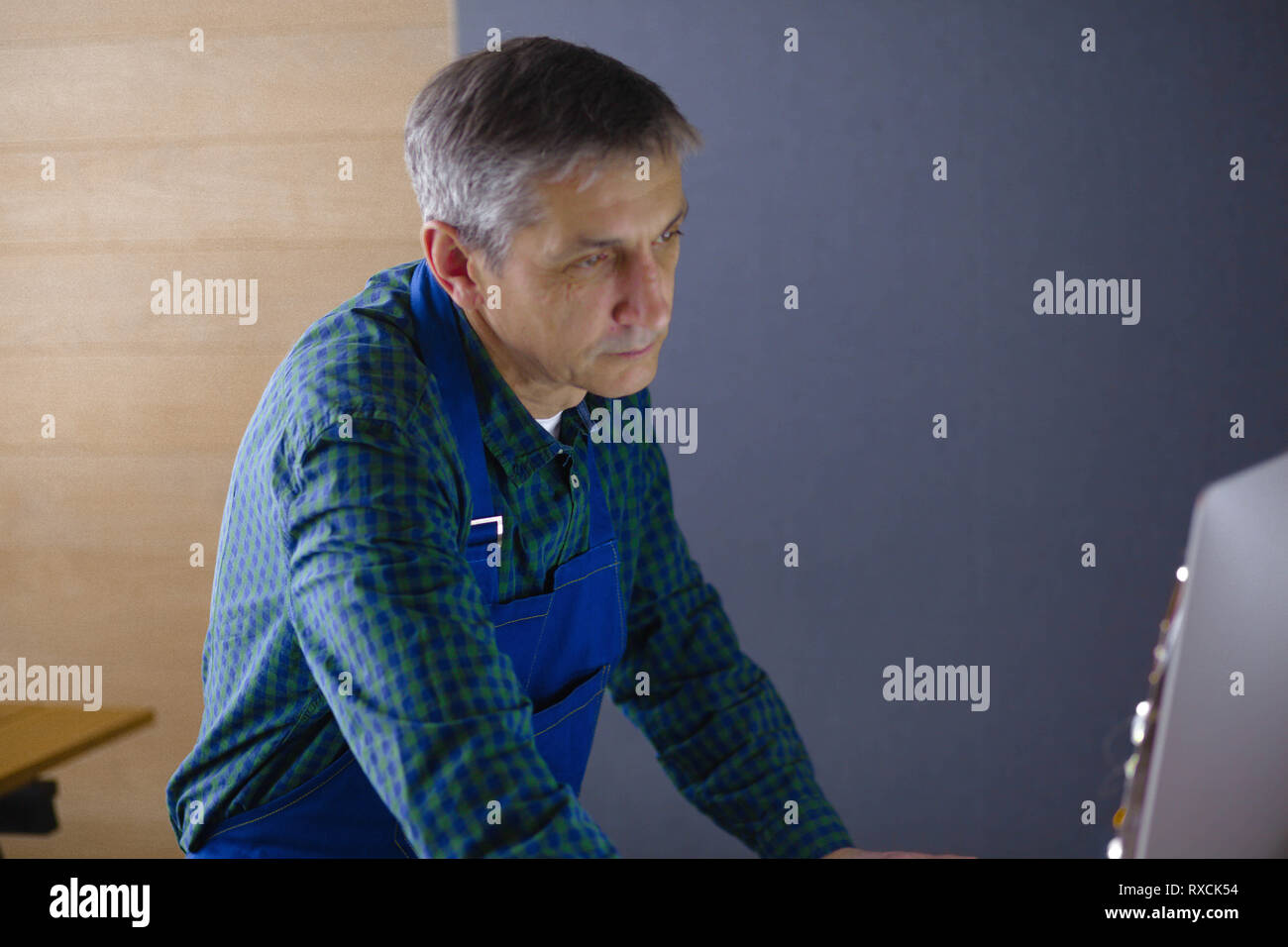 profession, carpentry, woodwork and people concept - carpenter testing ...