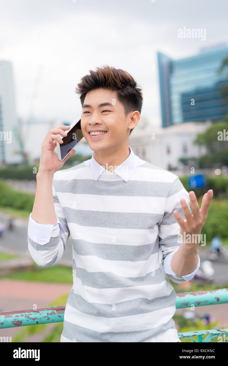 Cheerful young male traveler hi-res stock photography and images - Alamy