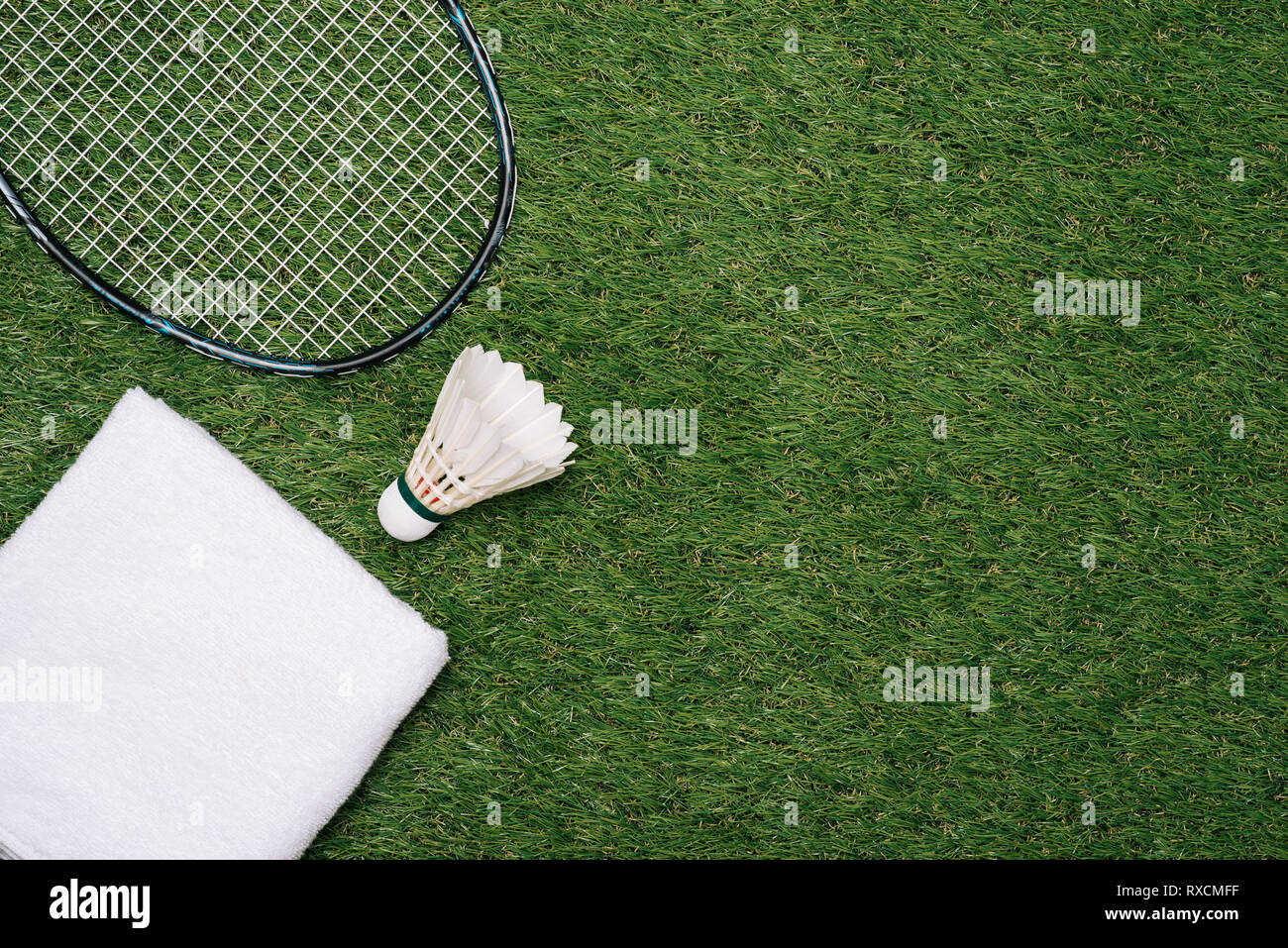 Badminton racket on the green , top view Stock Photo - Alamy