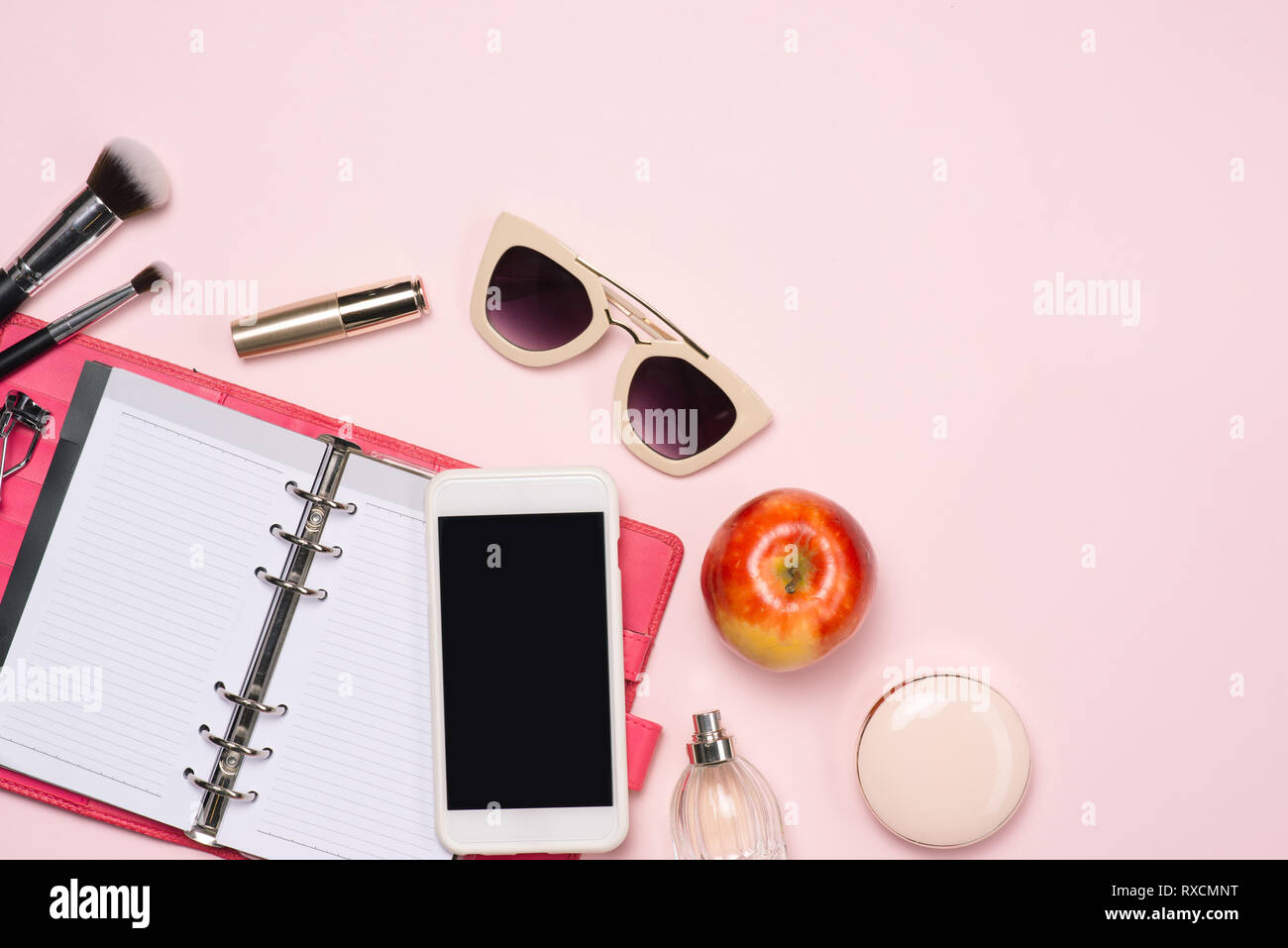 Composition with computer keyboard, cosmetics and flowers on color ...