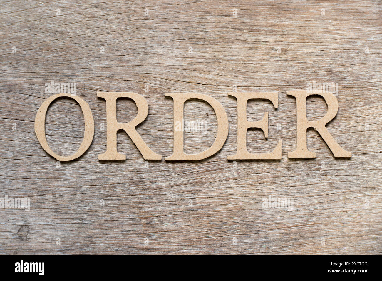 Alphabet letter in word order on wood background Stock Photo - Alamy