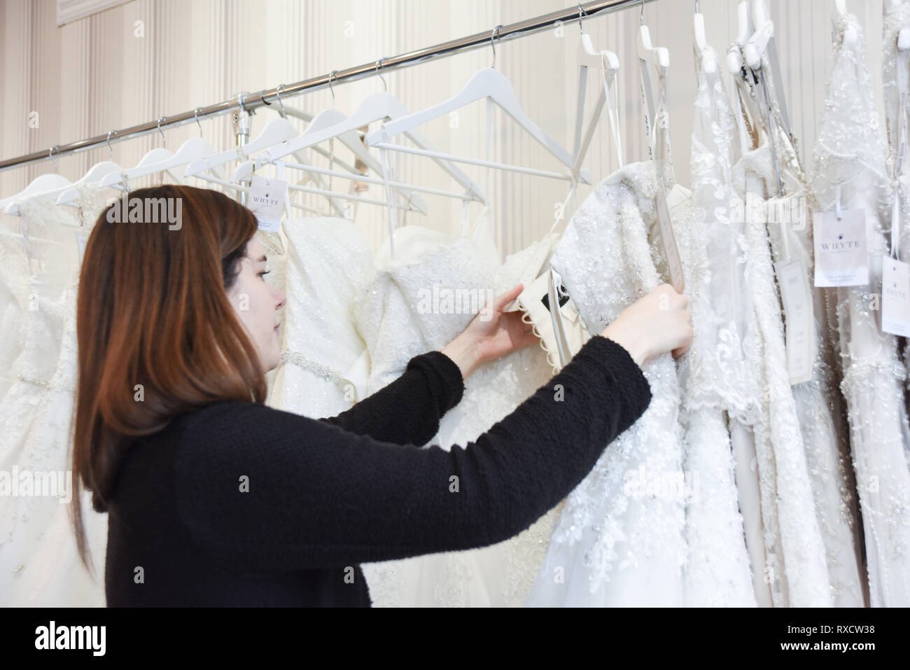 Selecting wedding dresses hi-res stock photography and images - Alamy