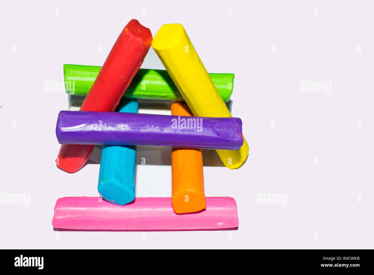 Concept of real estate, 3D of a house made out of clay sticks on a ...