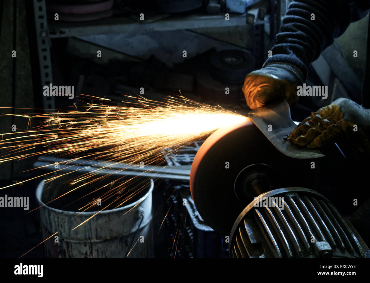 Sharpening a macheta Stock Photo - Alamy