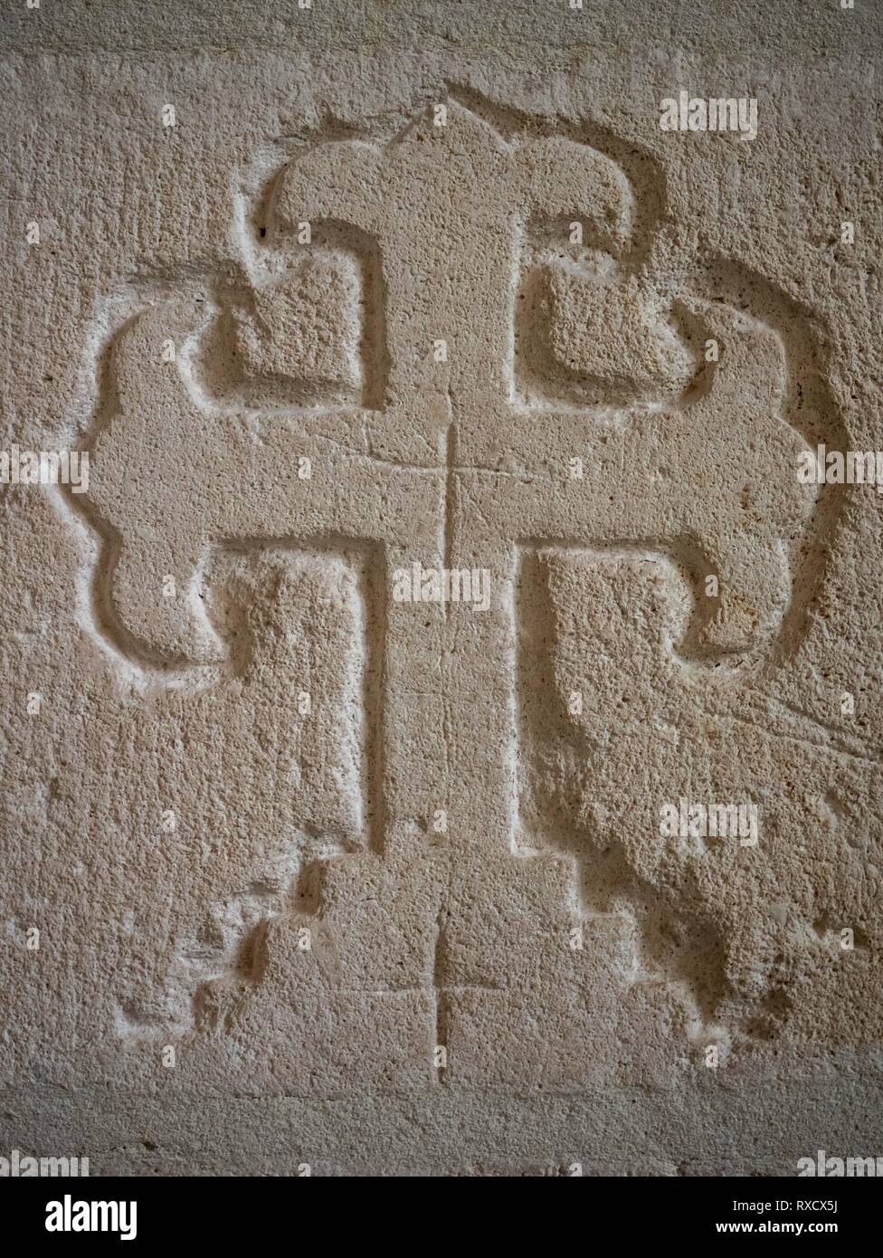 Cross carved on a wall in the Cathedral of Burgos, Spain Stock Photo ...