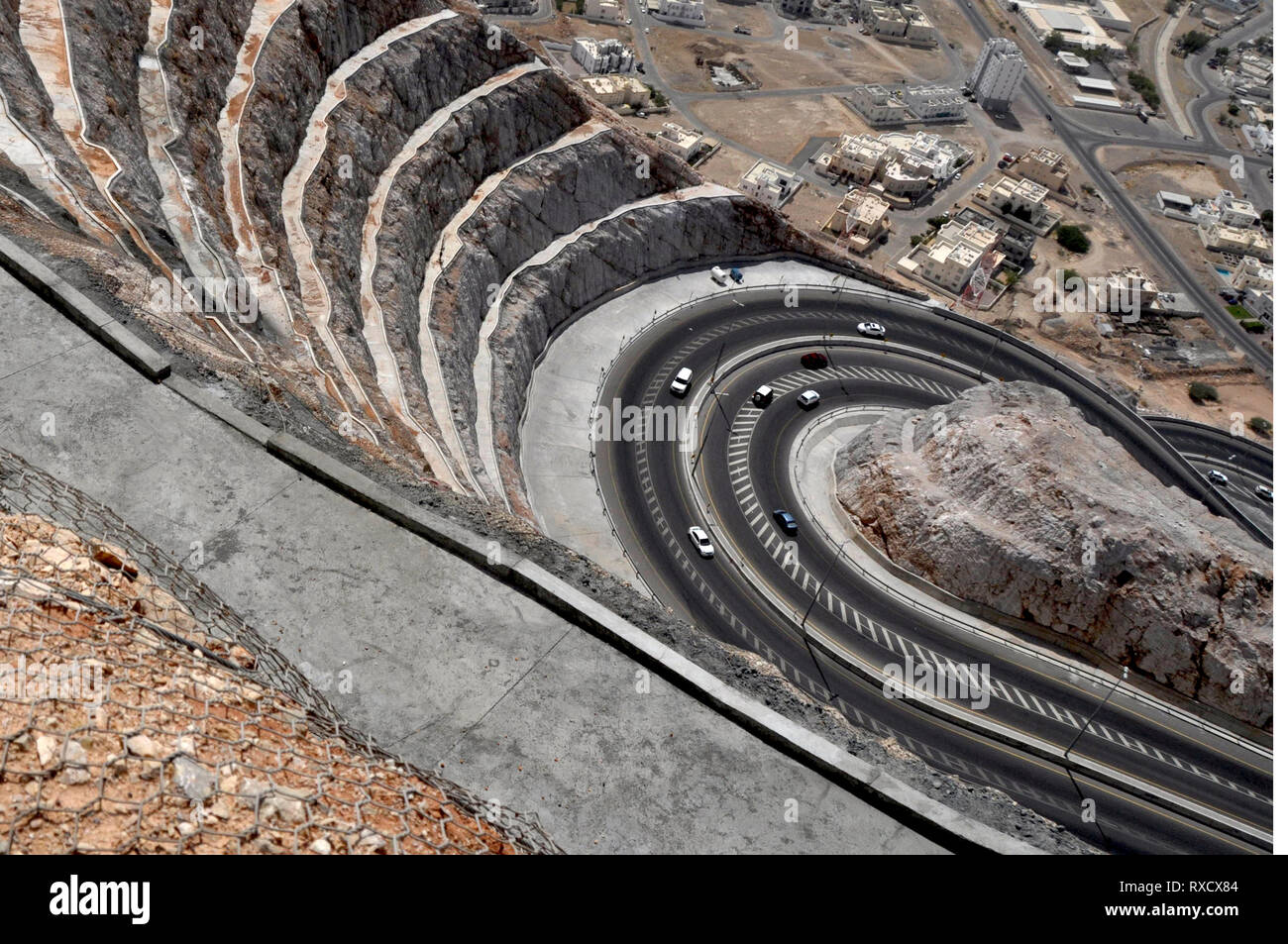 Dramatic highway bends on the road into Muscat Oman from the south ...