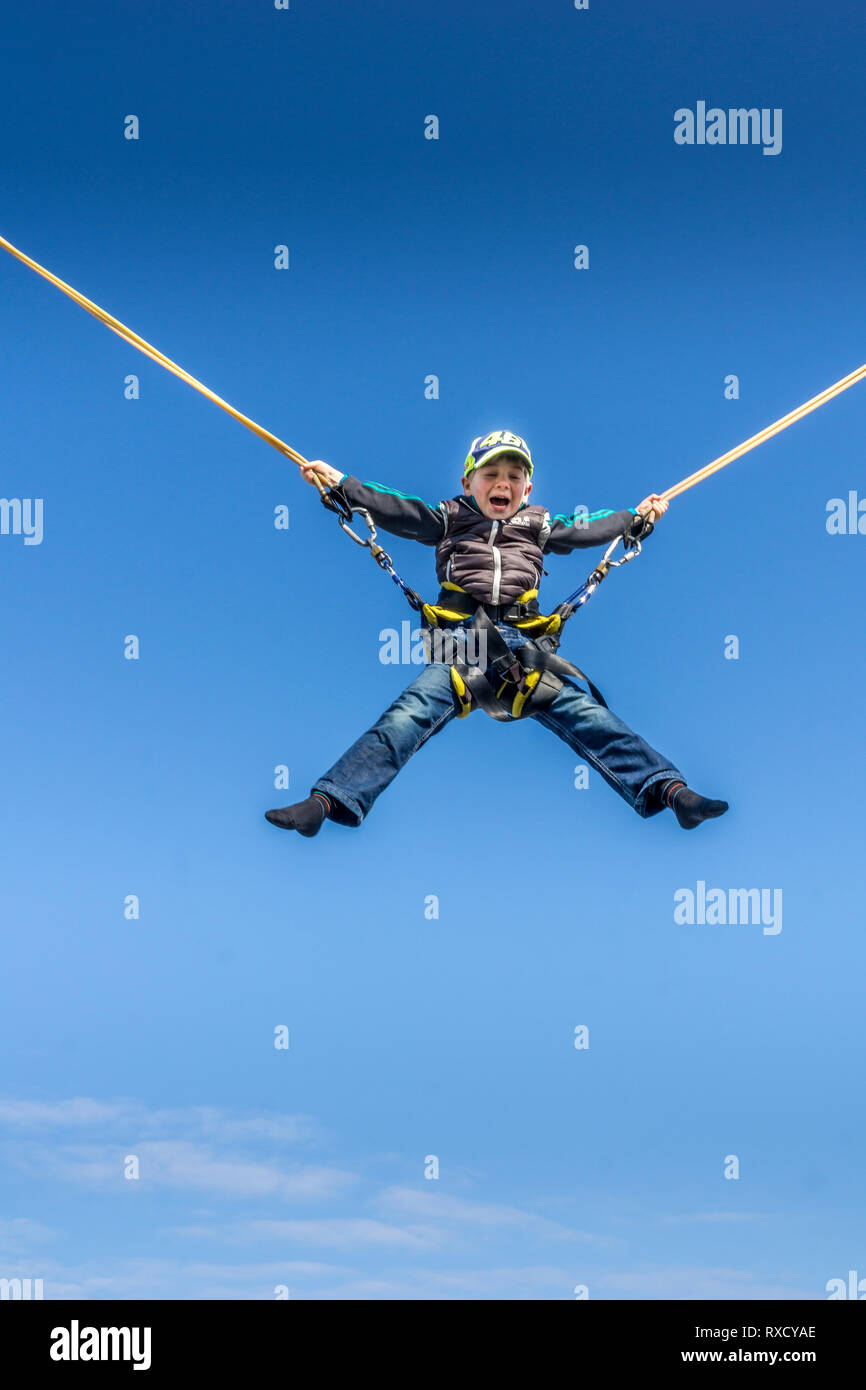 Children bungee jumping hi-res stock photography and images - Alamy