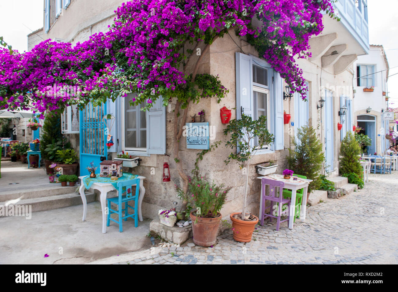 A street scene in the village of Alacati, a Greek built town on Turkey ...