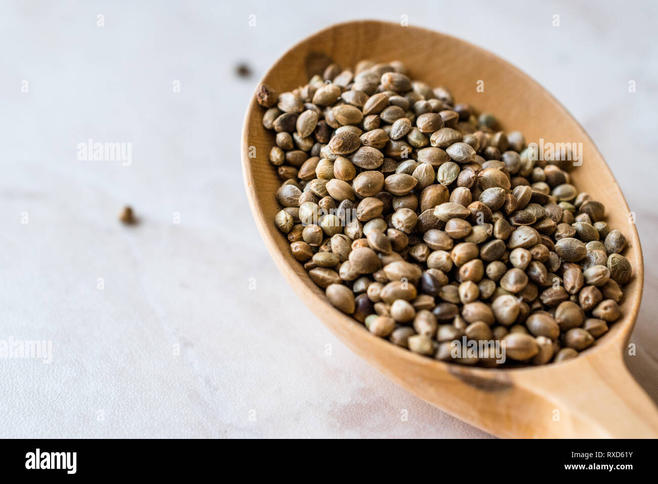 Organic Roasted Hemp Seeds in Wooden Spoon. Organic Food Stock Photo ...