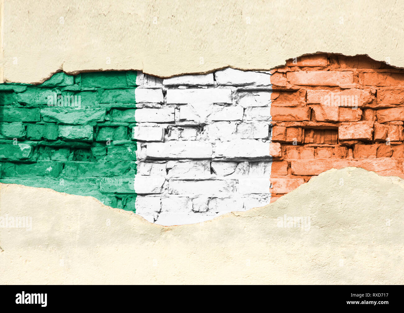 National flag of Ireland on a brick background. Brick wall with ...