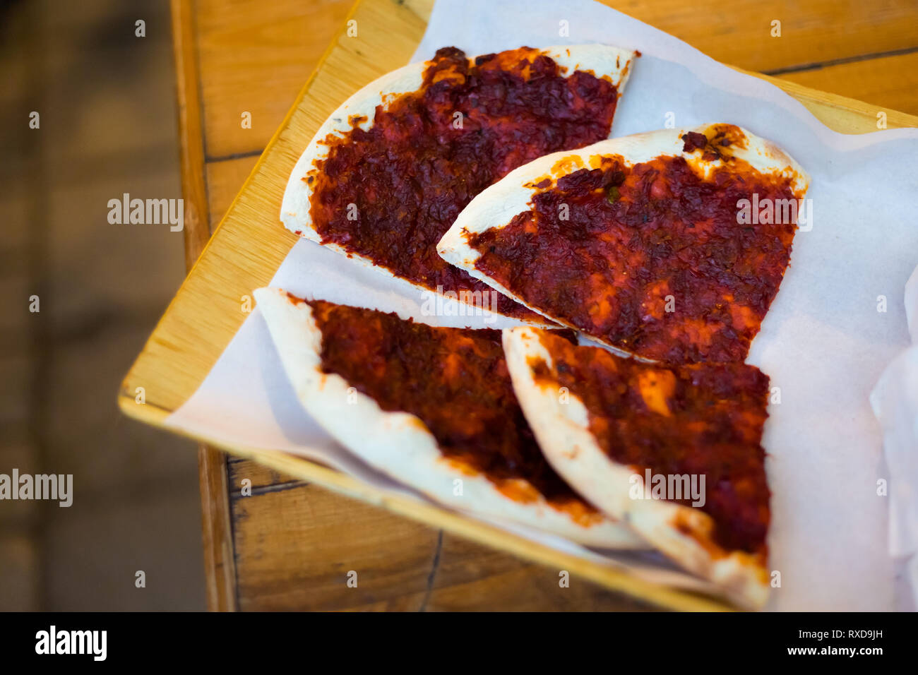 Oven baked flat bread with muhammara paste in local restaurant in ...