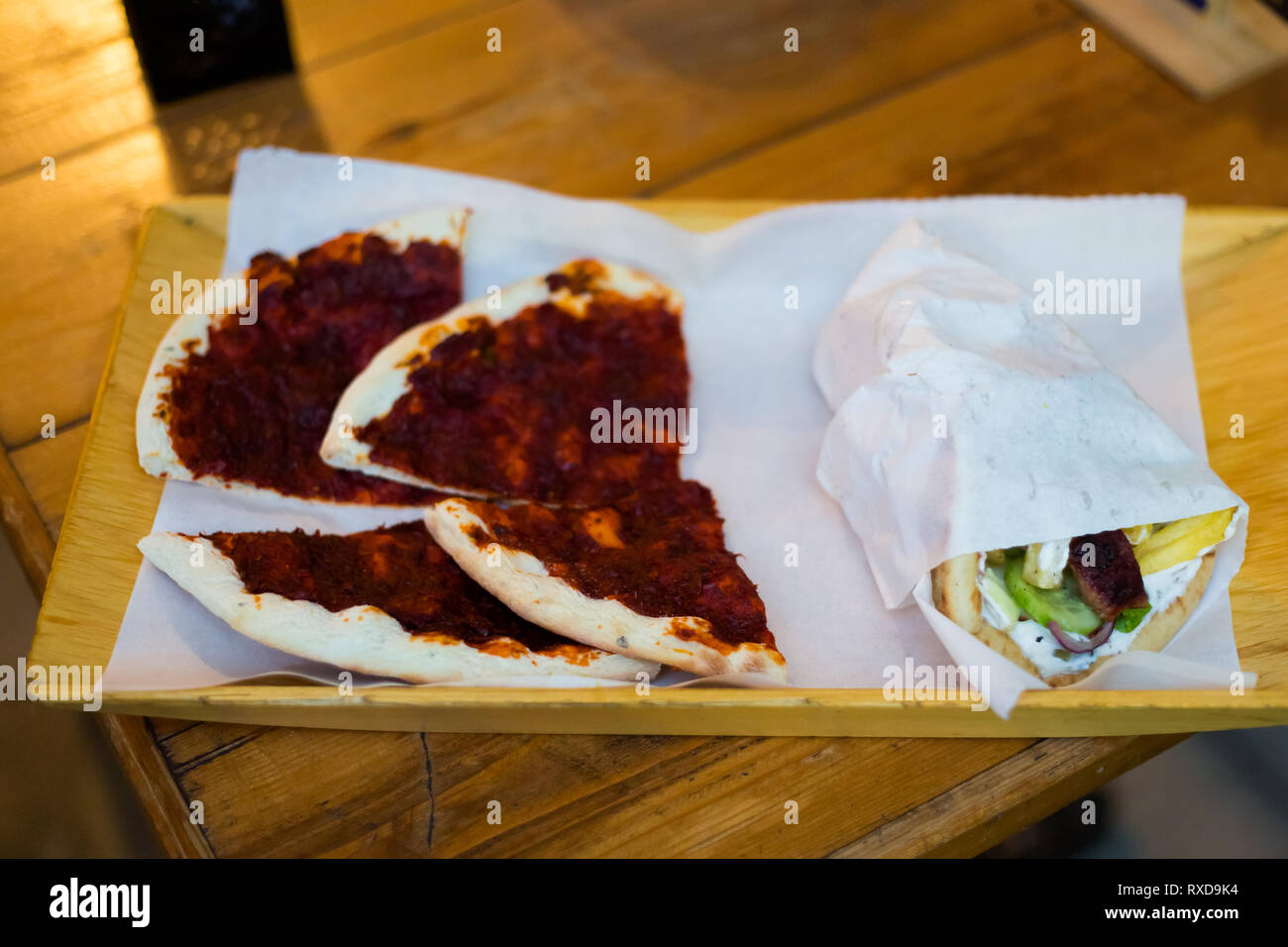 Oven baked flat bread with muhammara paste in local restaurant in ...