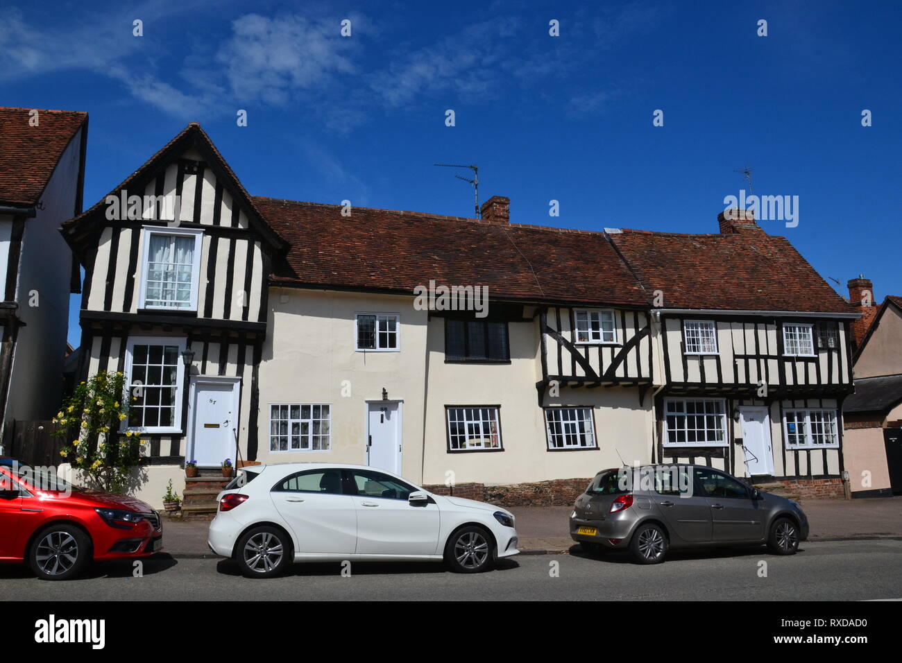 Historic Tudor half-timbered buildings in Lavenham, Suffolk, UK. Sunny ...