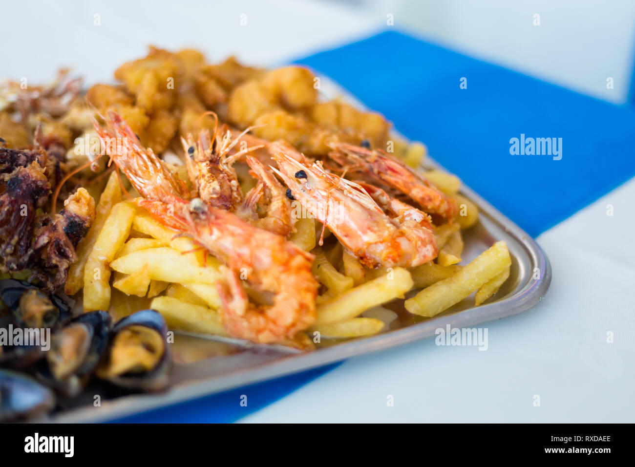 Crispy seafood mix platter in local restaurant in Larnaca. Traditional ...