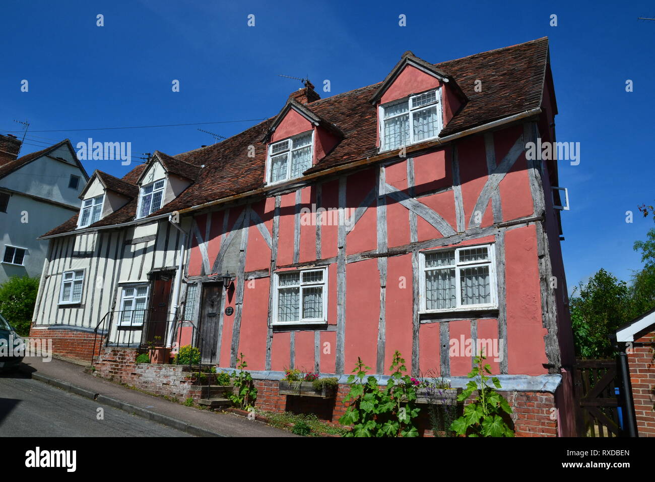 Historic Tudor half-timbered buildings in Lavenham, Suffolk, UK. Sunny ...