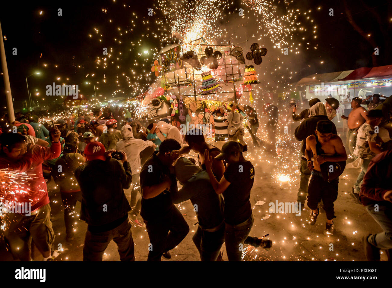 Tultepec, Mexico. 8th Mar 2019. A cardboard bull filled with fireworks ...