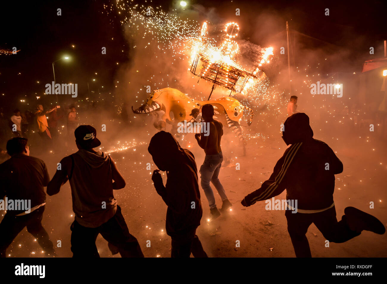 Tultepec, Mexico. 8th Mar 2019. A cardboard bull filled with fireworks ...