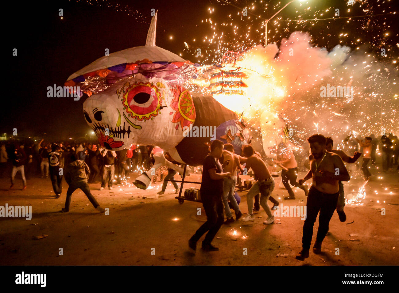 Tultepec, Mexico. 8th Mar 2019. A cardboard bull filled with fireworks ...