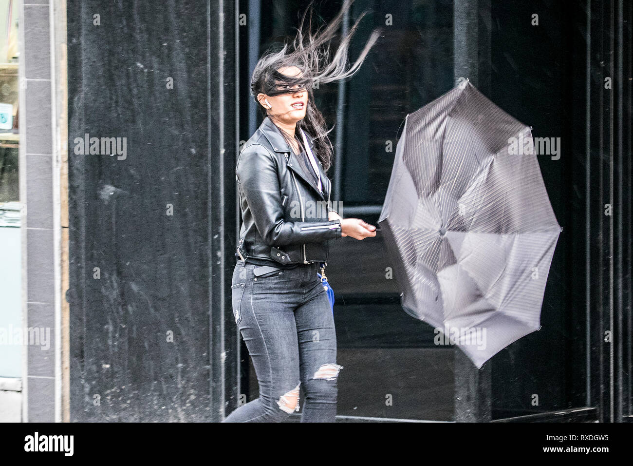 Hair blown in face by wind hi-res stock photography and images - Alamy