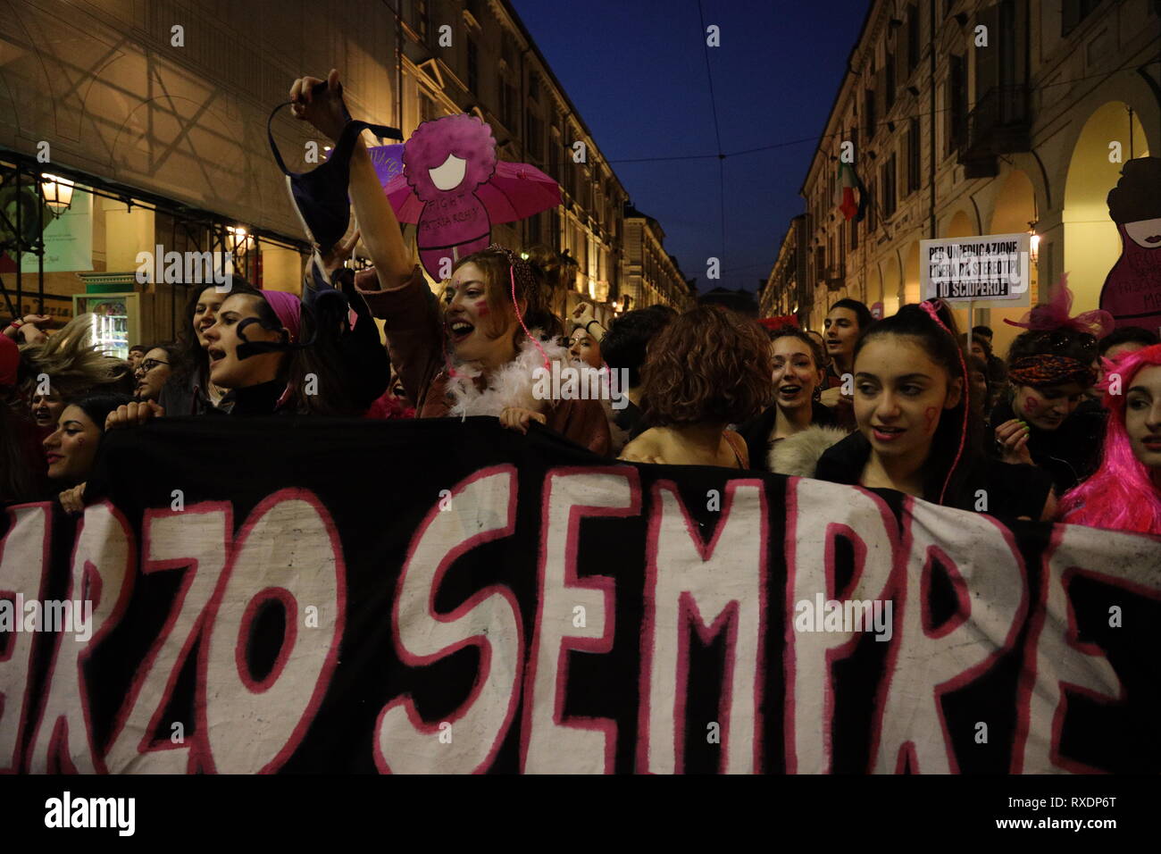 Turin, Italy. 8th March 2019. Women go on strike and demonstrate to ...