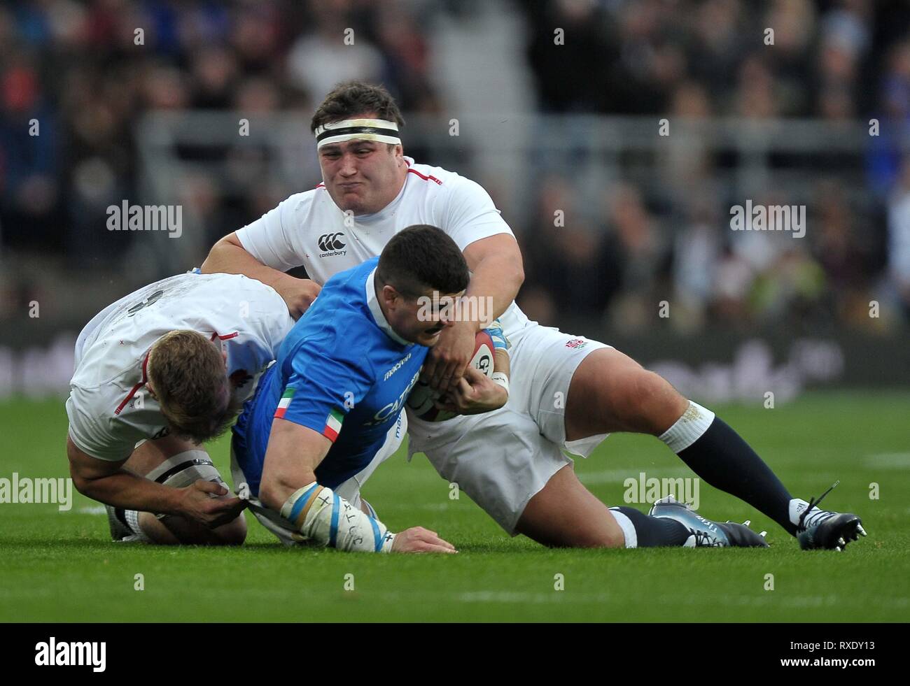 London, UK. 09th Mar, 2019. Sebastian Negri (Italy) is tackled by ...