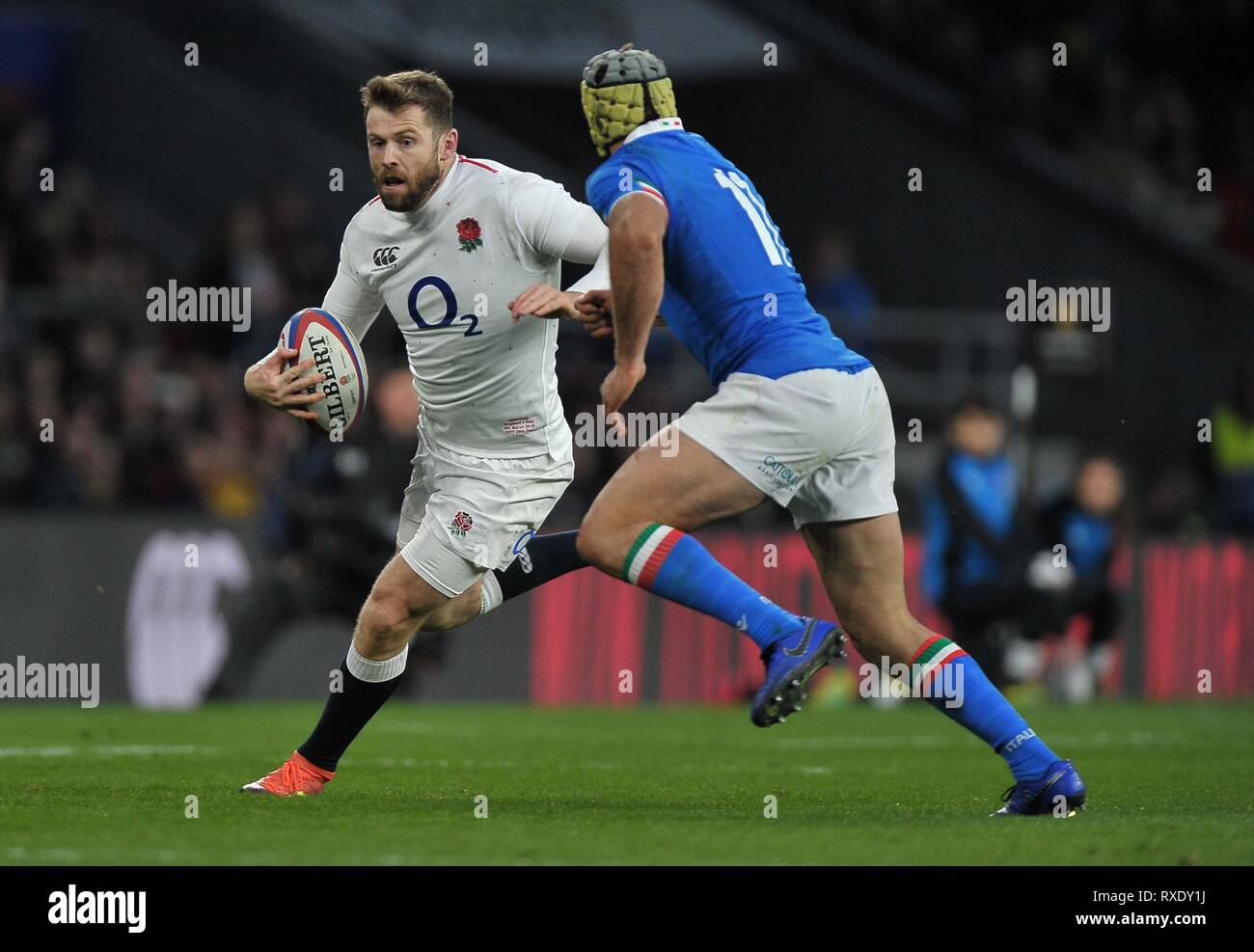 London, UK. 09th Mar, 2019. Elliot Daly (England) tries to go past ...