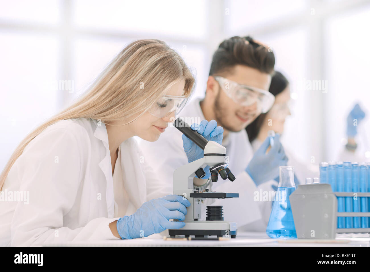 close up.woman scientist conducting experiments with liquid Stock Photo ...