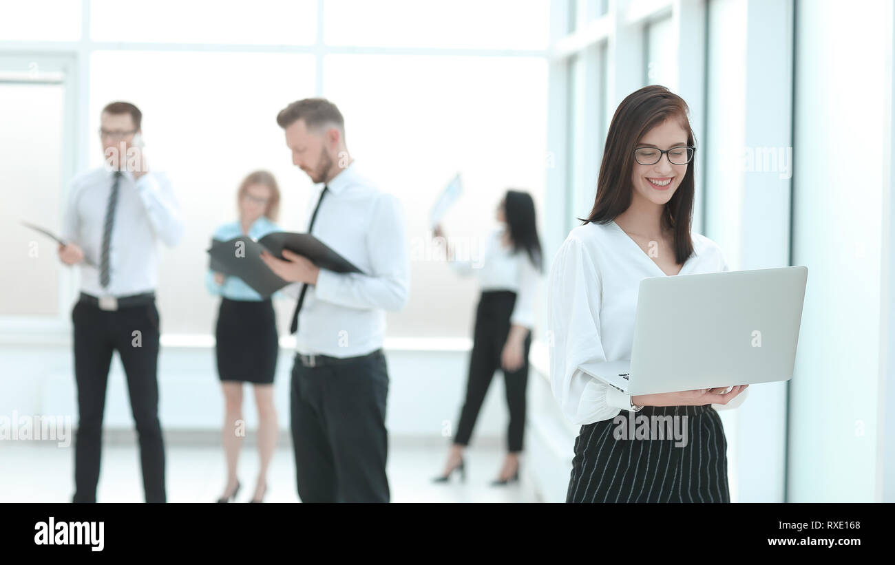 employees standing in the office lobby before a business meeting Stock ...