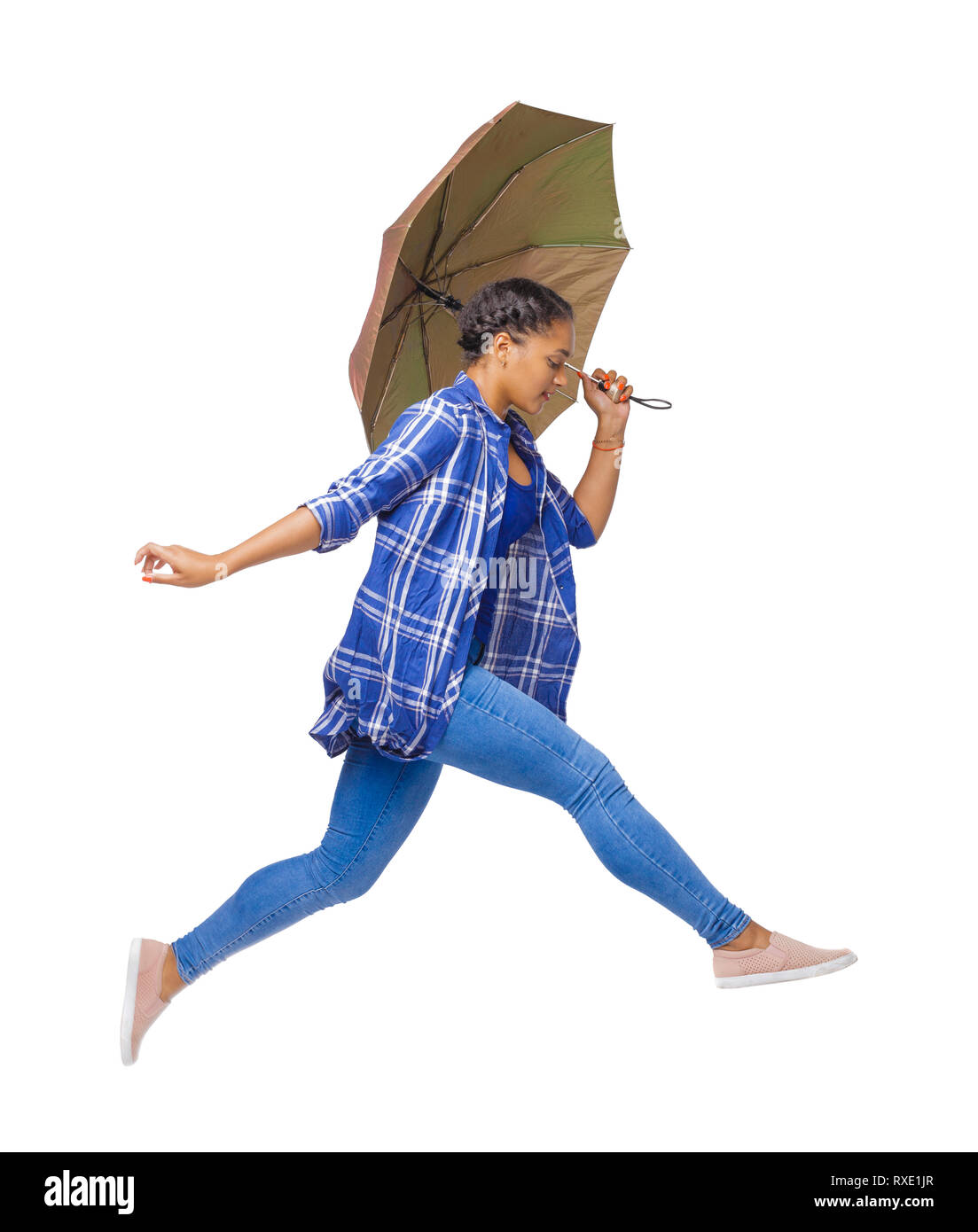 Woman jumping over puddle hi-res stock photography and images - Alamy