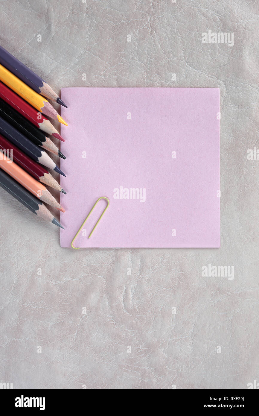 sheet of paper for notes and colored pencils on paper background Stock ...