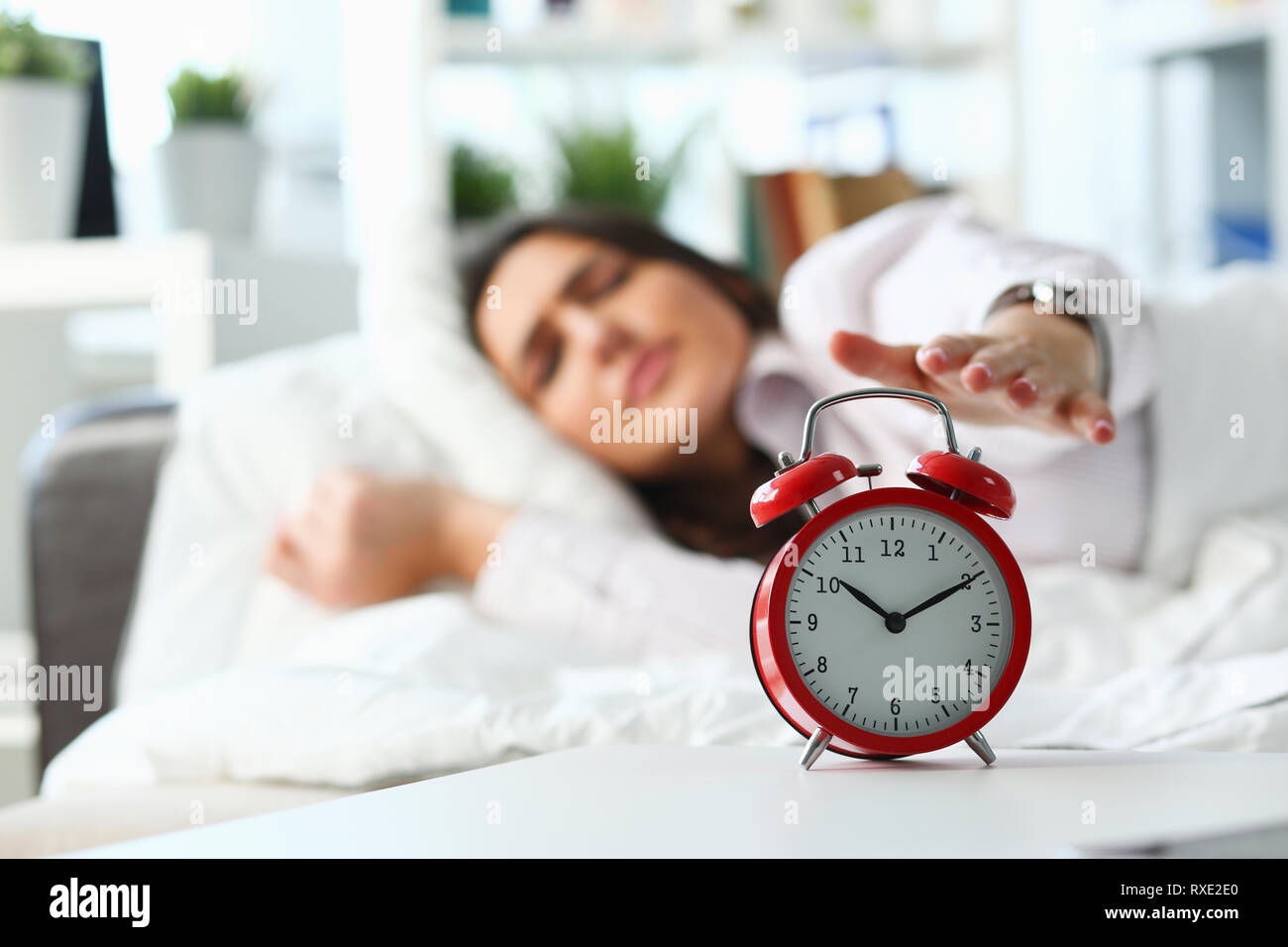Sleepy young woman portrait with one Stock Photo - Alamy