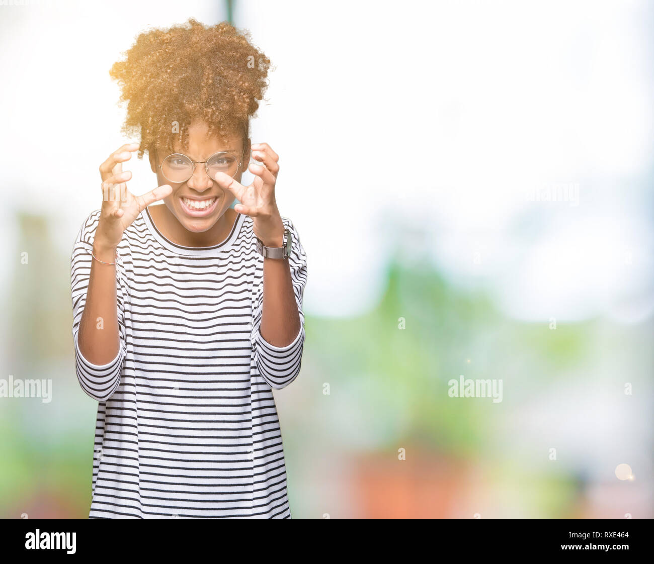 Beautiful young african american woman wearing glasses over isolated ...