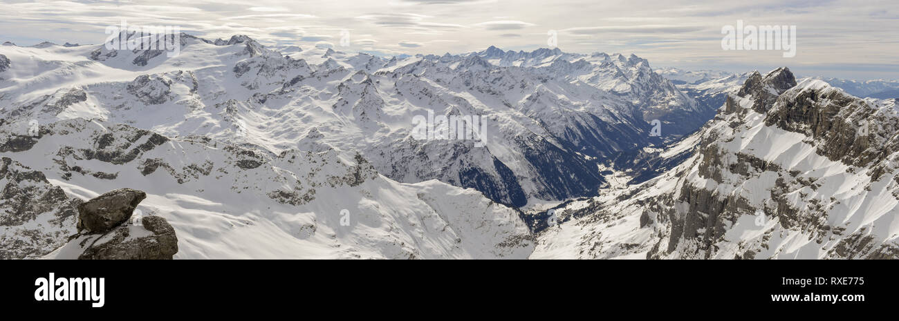 Winter landscape view from mount Titlis over Engelberg to the swiss ...