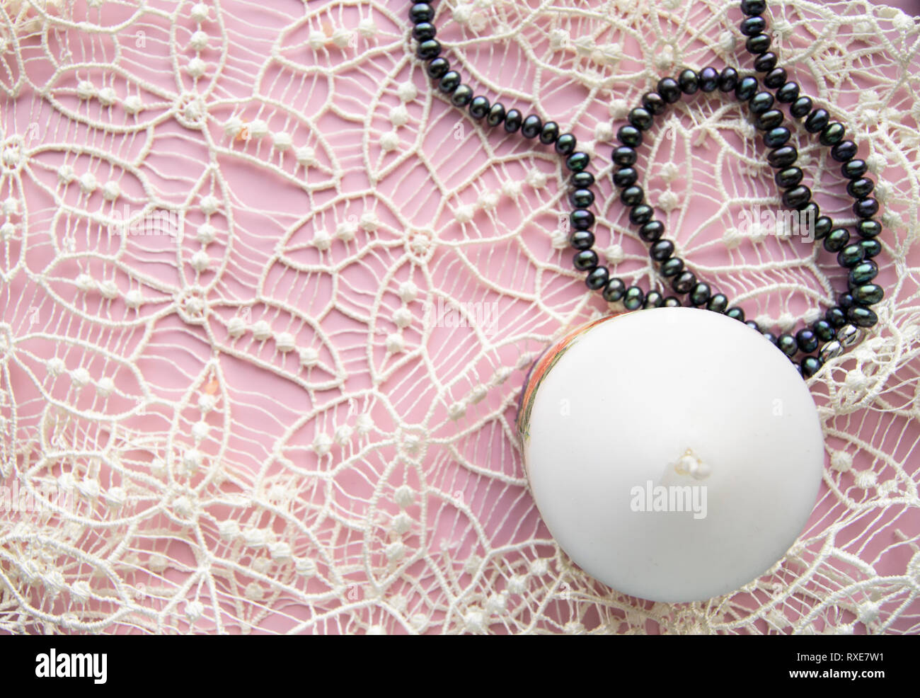 Flatlay pink background, graceful white expensive lace and elegant ...