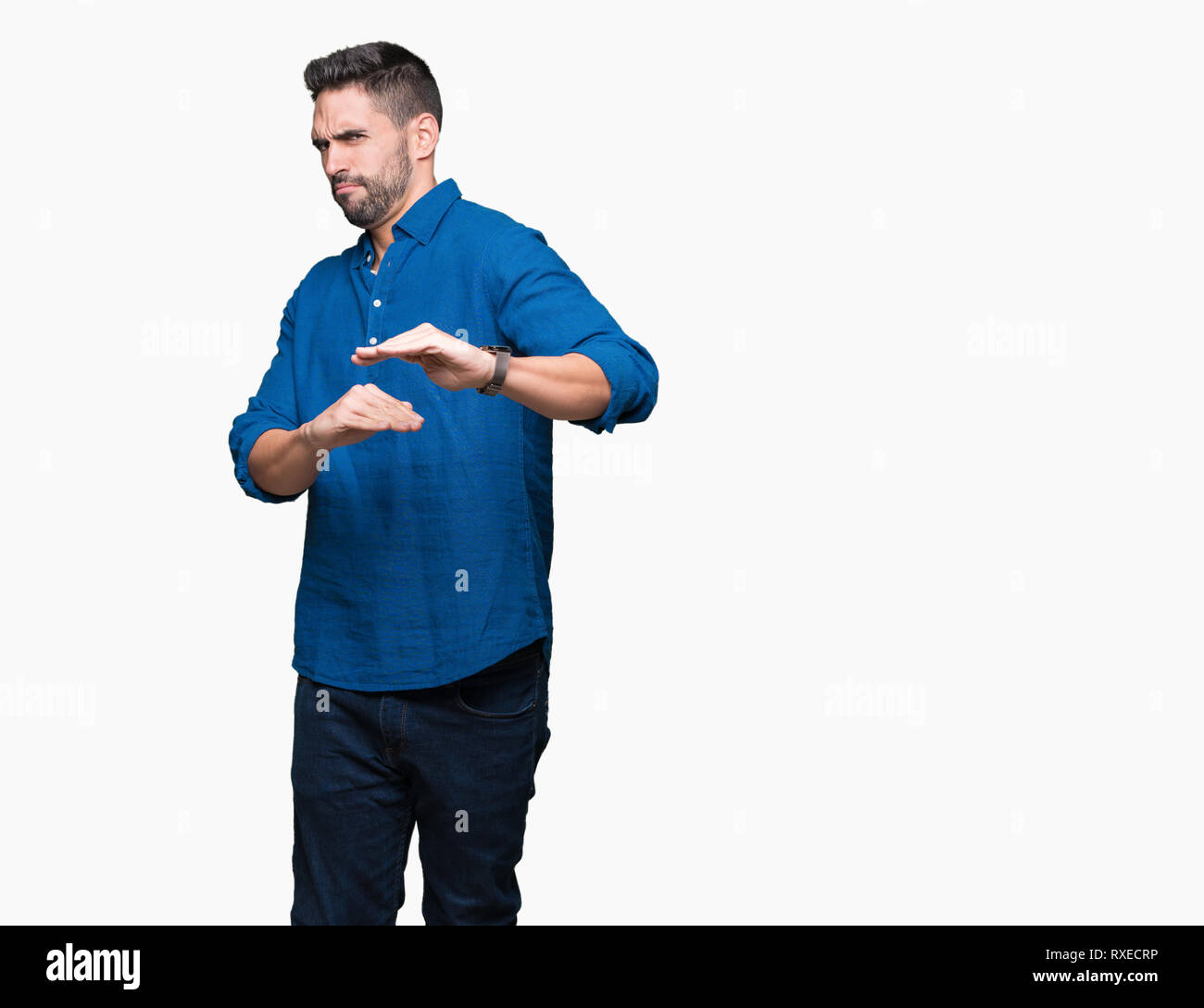 Young handsome man over isolated background disgusted expression ...