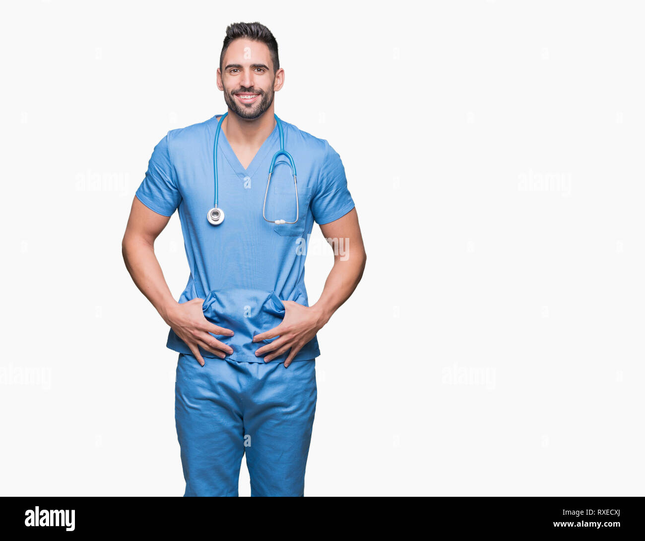 Handsome young doctor surgeon man over isolated background with a happy ...