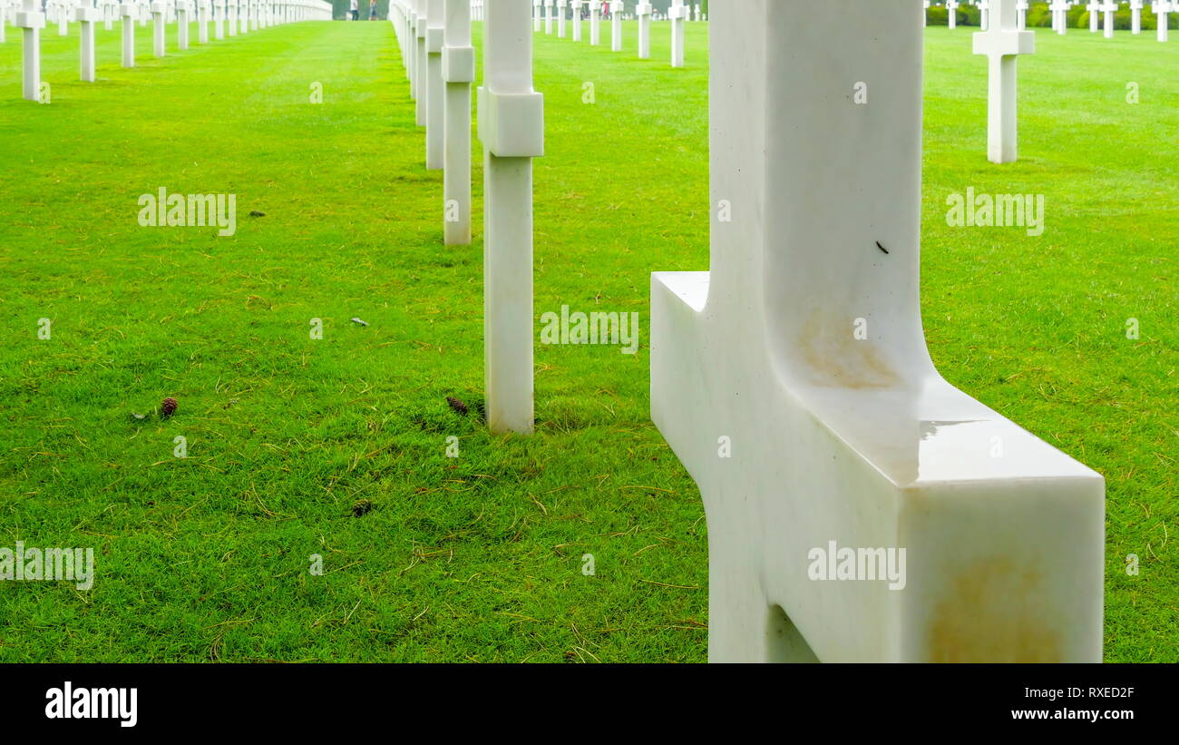 The straight line formed by the cross in Normandy Cemetery. The ...